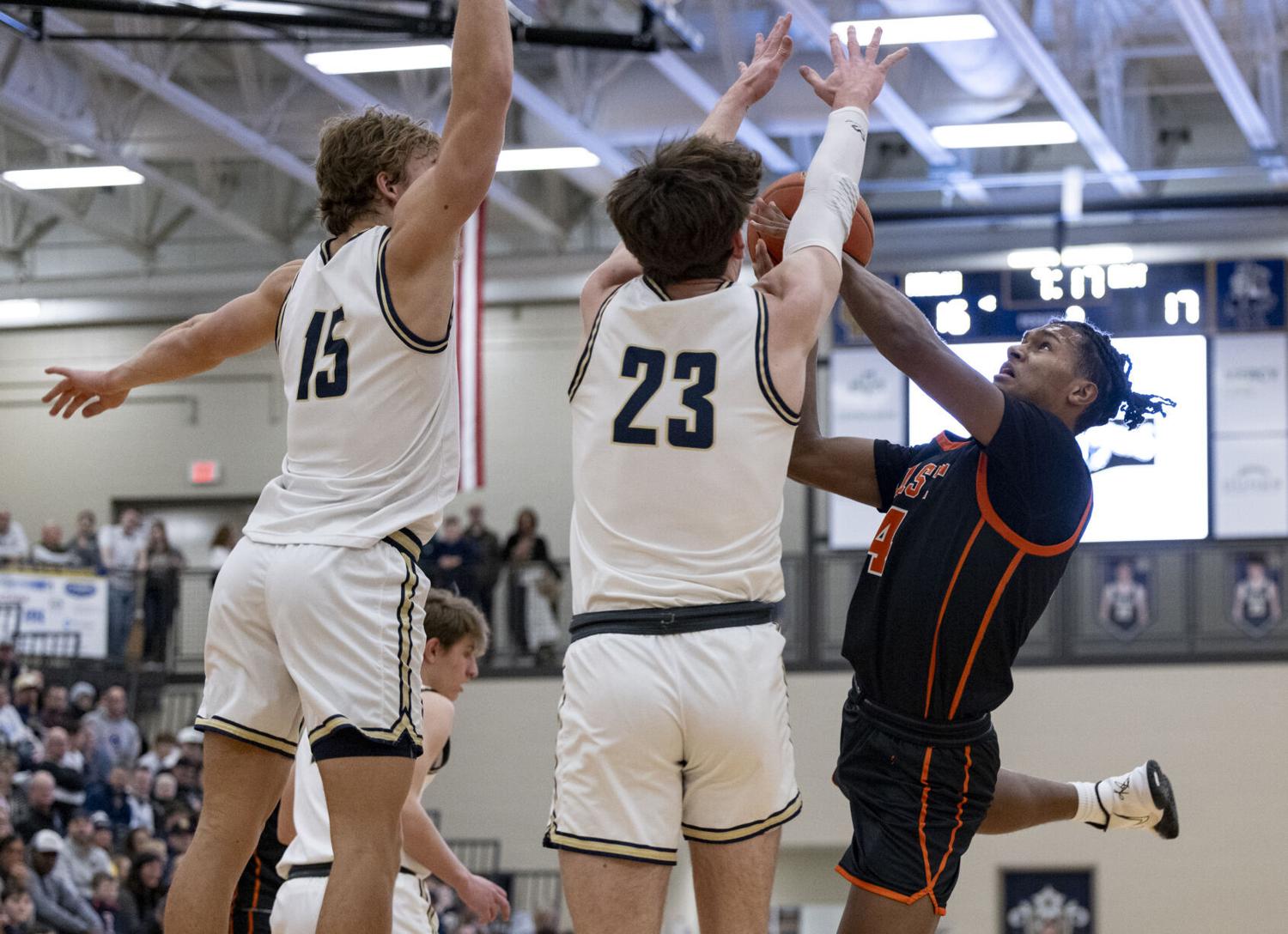 Boys basketball: East wins, earns season split with Heelan