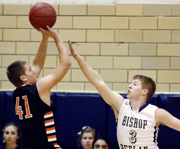 Bishop Heelan downs Warriors with last-second shot