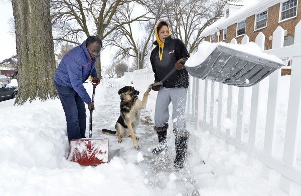 Photos: Residents clean up after winter storm