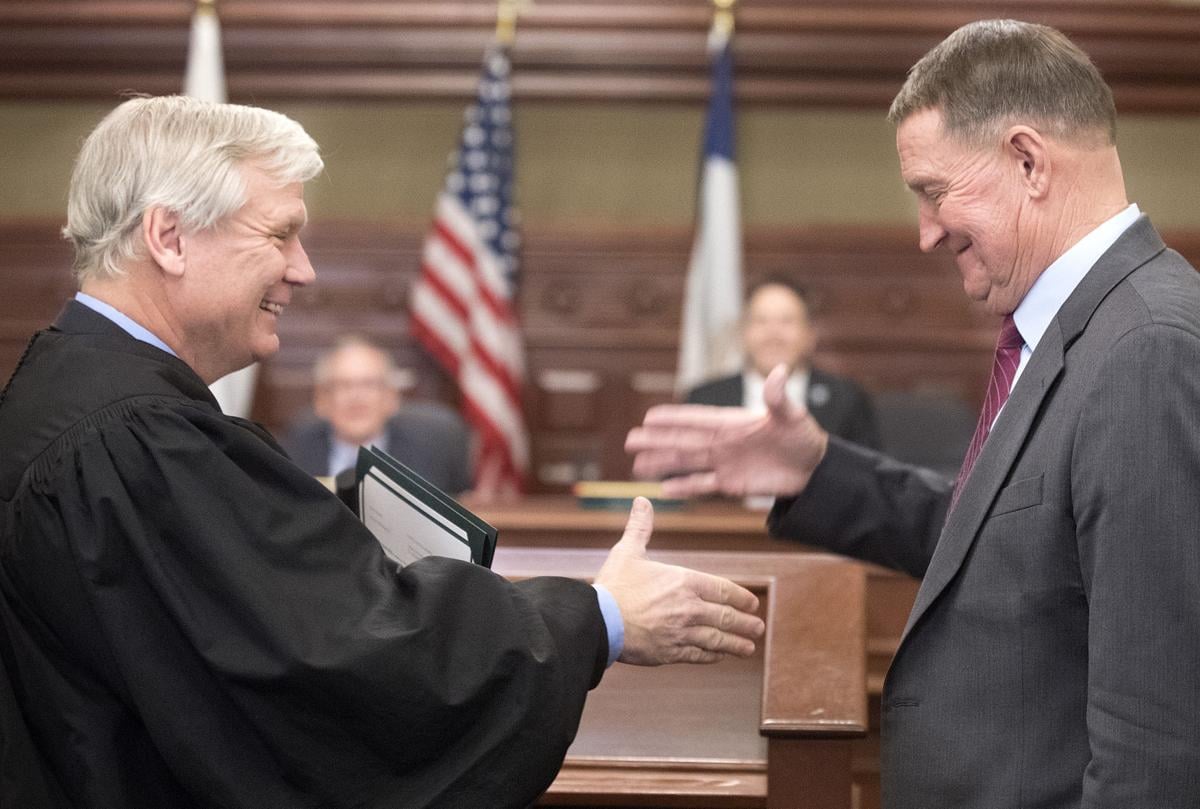 Re-elected council members take oaths, outline 2018 goals