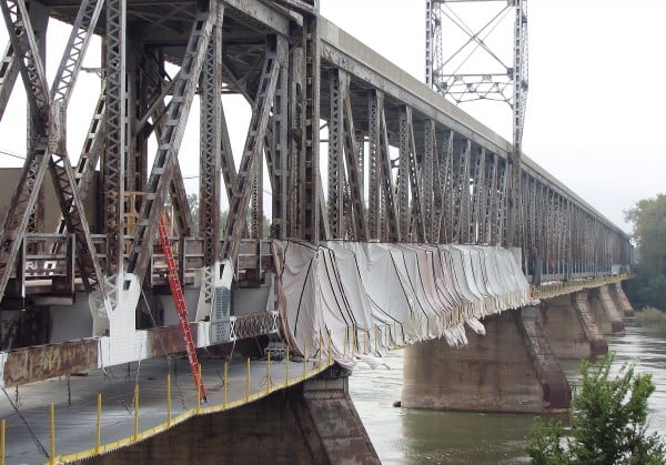 Pedestrians waiting to set foot on Meridian Bridge