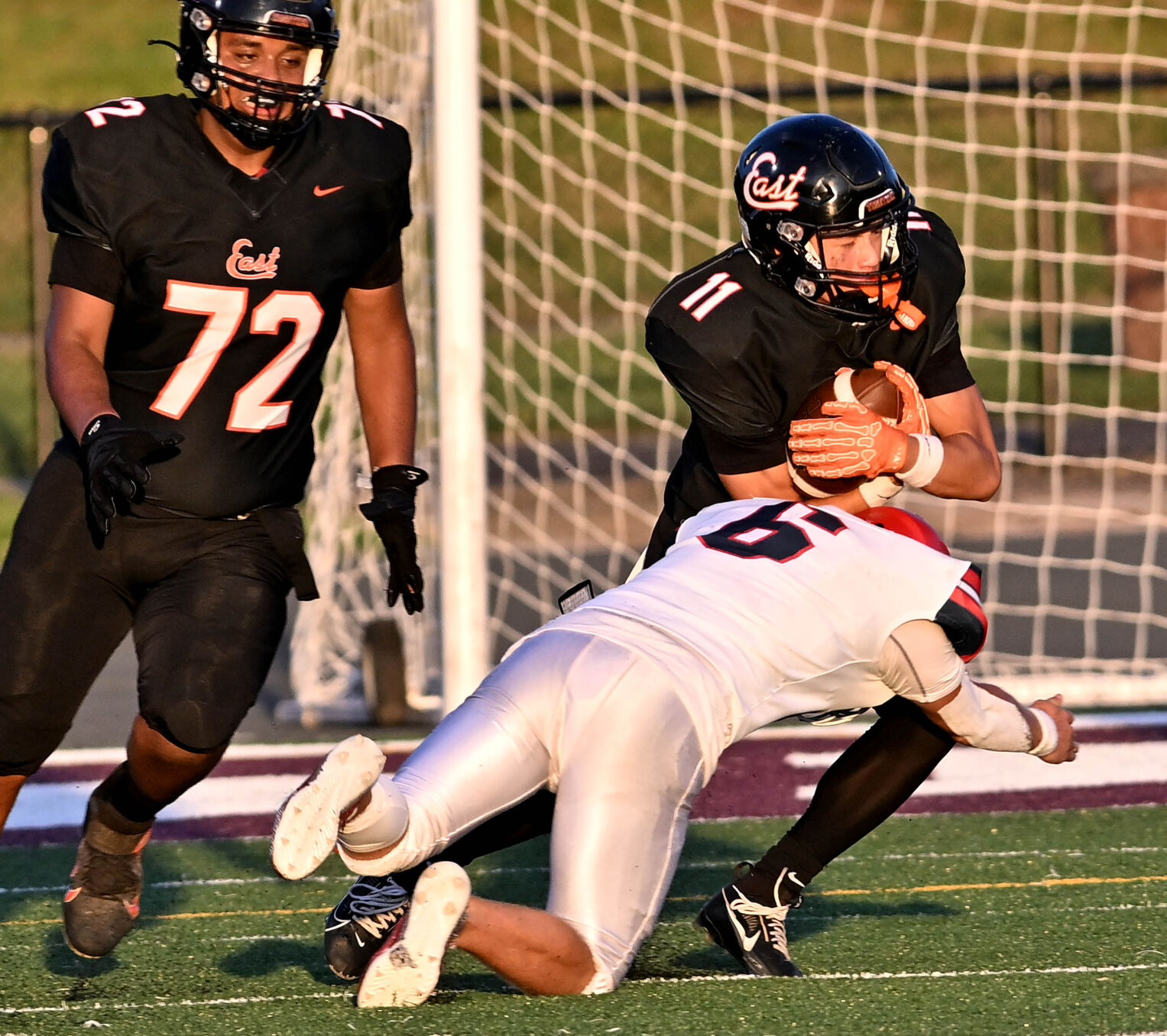 Prep football: East shuts down North, opens season with win