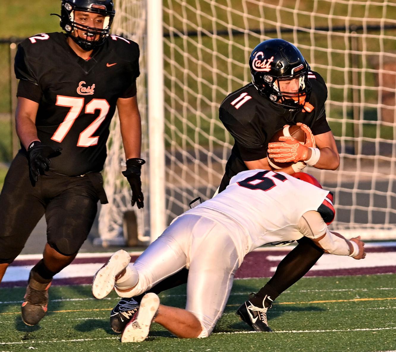 Prep football: East shuts down North, opens season with win