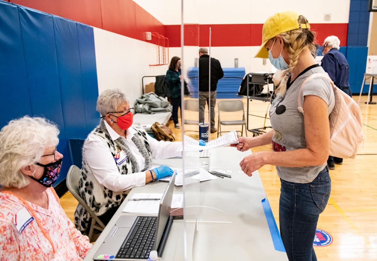 First-time Sioux City poll workers challenged by jobs amid busy day of ...