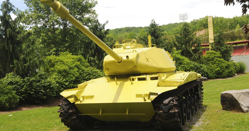 Ready, aim, oops! Historic tank turns lemon-lime yellow