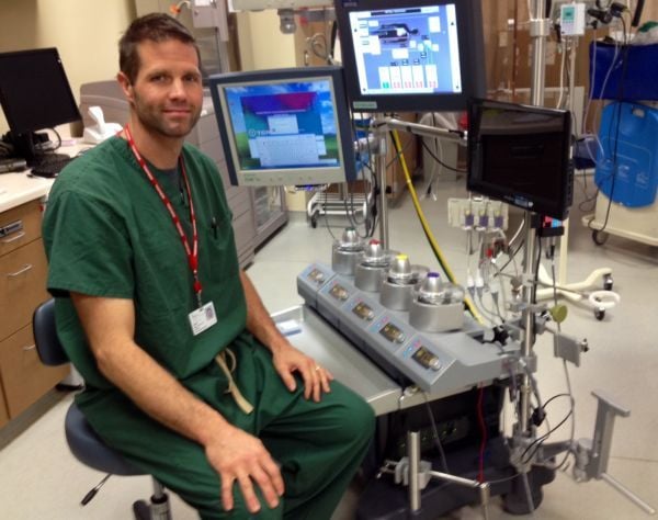 Perfusionist controls heart, lungs' fuction during open heart surgery