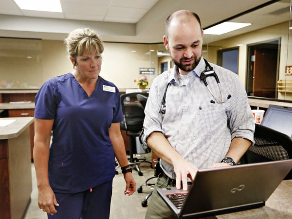 Young doctor learns the ropes at Sioux City medical practice