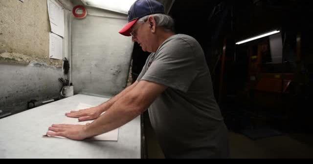 Richard Fortune shows how to fold a pressman's hat