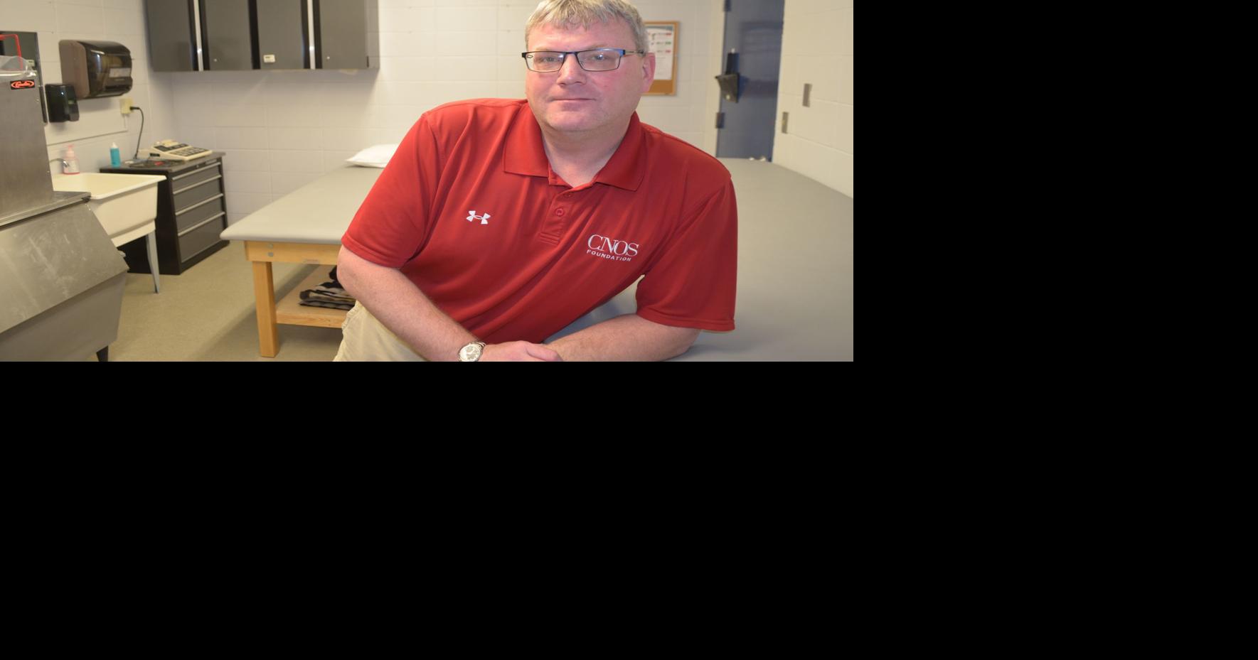 Athletic trainer, publisher earn Iowa honors