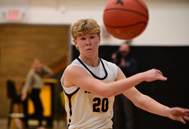 Boys basketball: Blackhawks hang on to ring in '24 with win