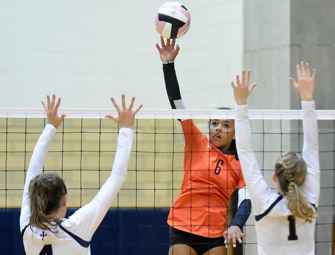Volleyball: Heelan rallies in five past East