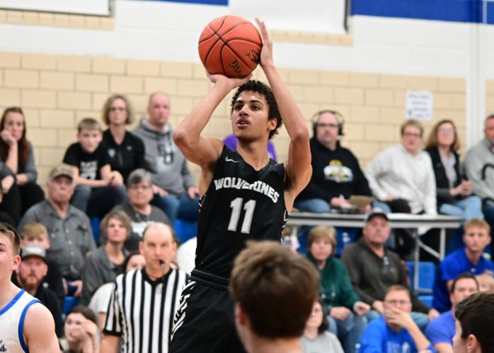 Boys high school basketball: Lopsided wins help area teams move on