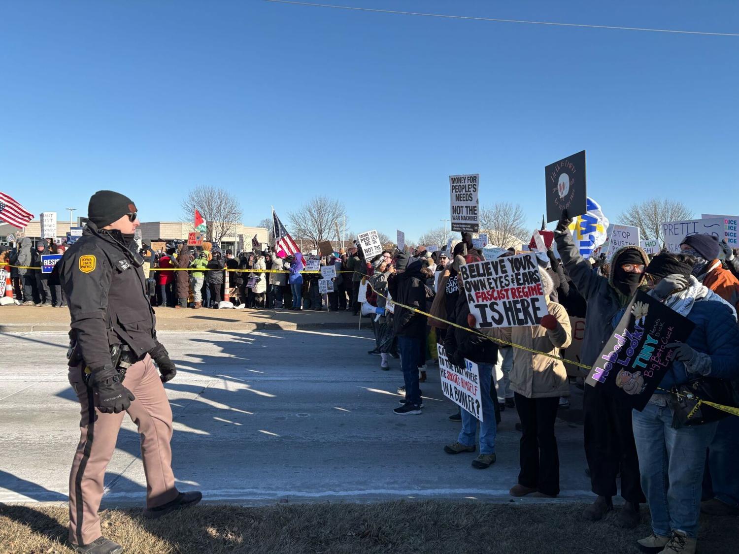 Thousands protest immigration enforcement as Trump visits Iowa