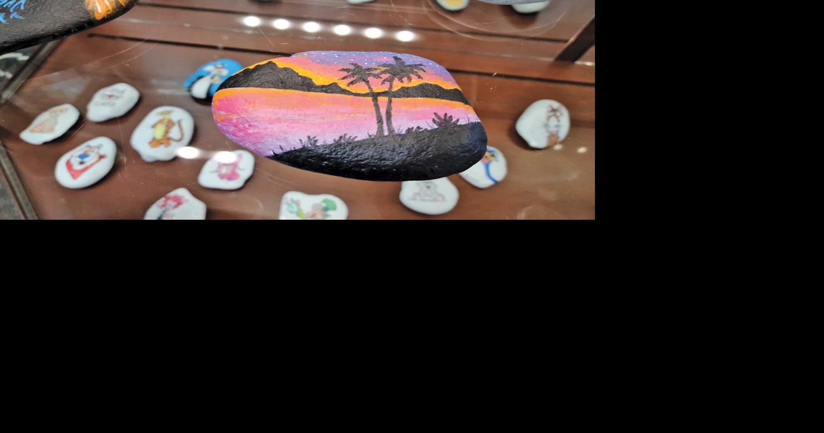 Painted rocks by Rick Johnston are in the MOarts Gallery Display Case ...