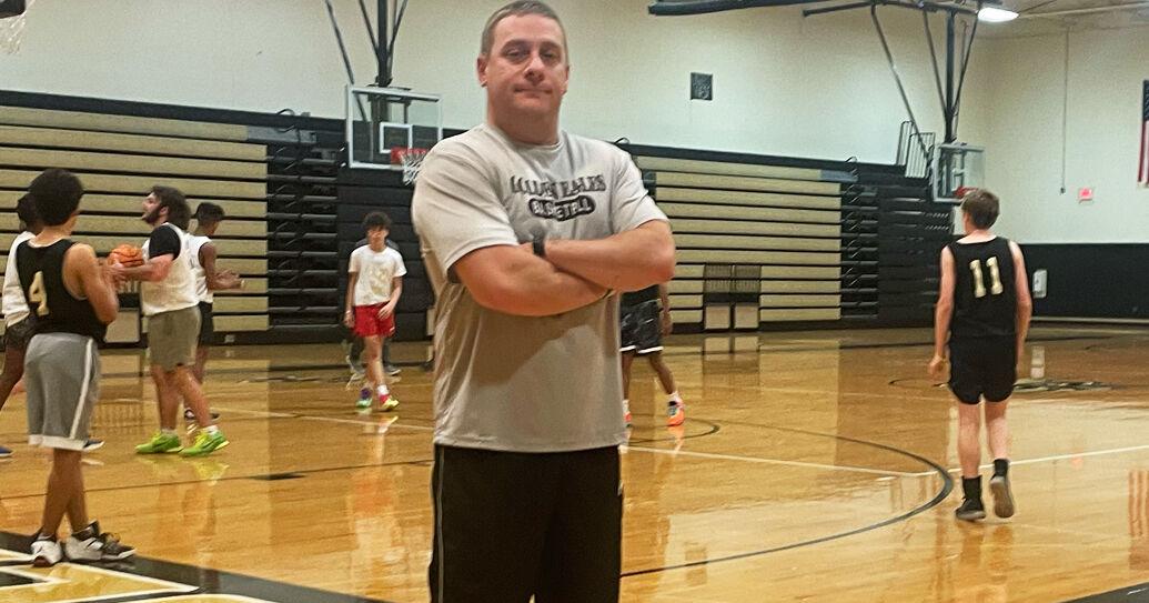Staunton River High School boys’ basketball coach Brandon Harris enters ...