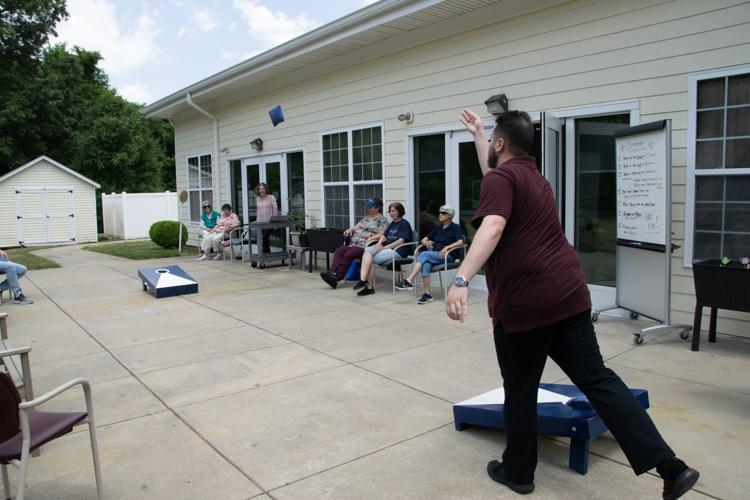 Just aim and toss: Senior center hosts cornhole tourney | Local ...