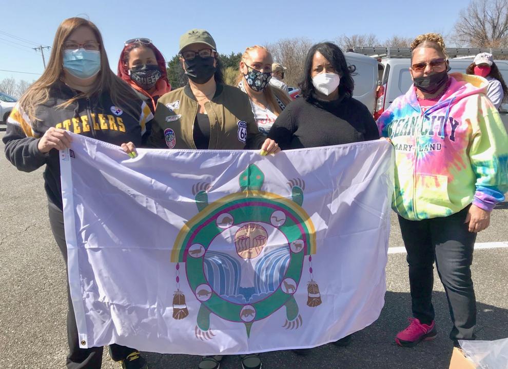 Pisctaway Conoy women with tribal flag | Local News | somdnews.com