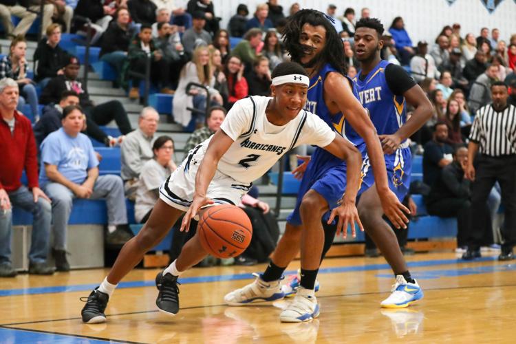 Calvert boys basketball hangs on for one-point win at Huntingtown ...
