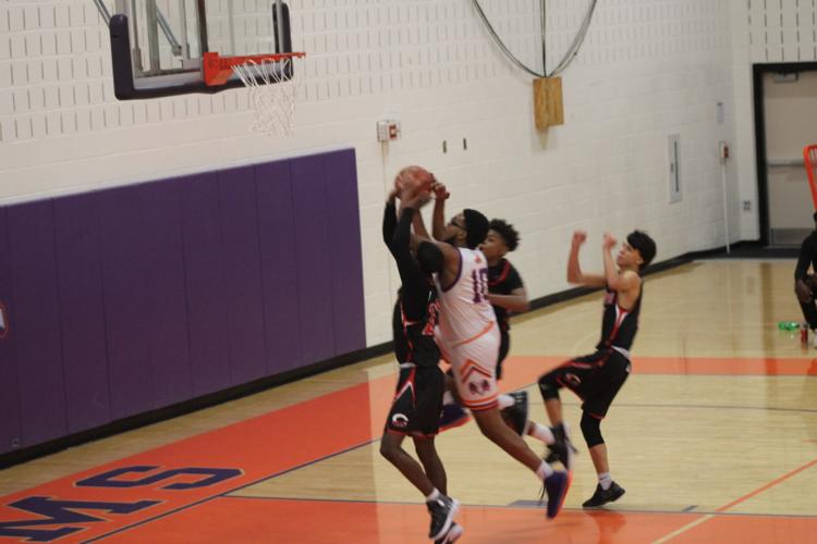 McDonough boys basketball wins season opener over Chopticon | News ...