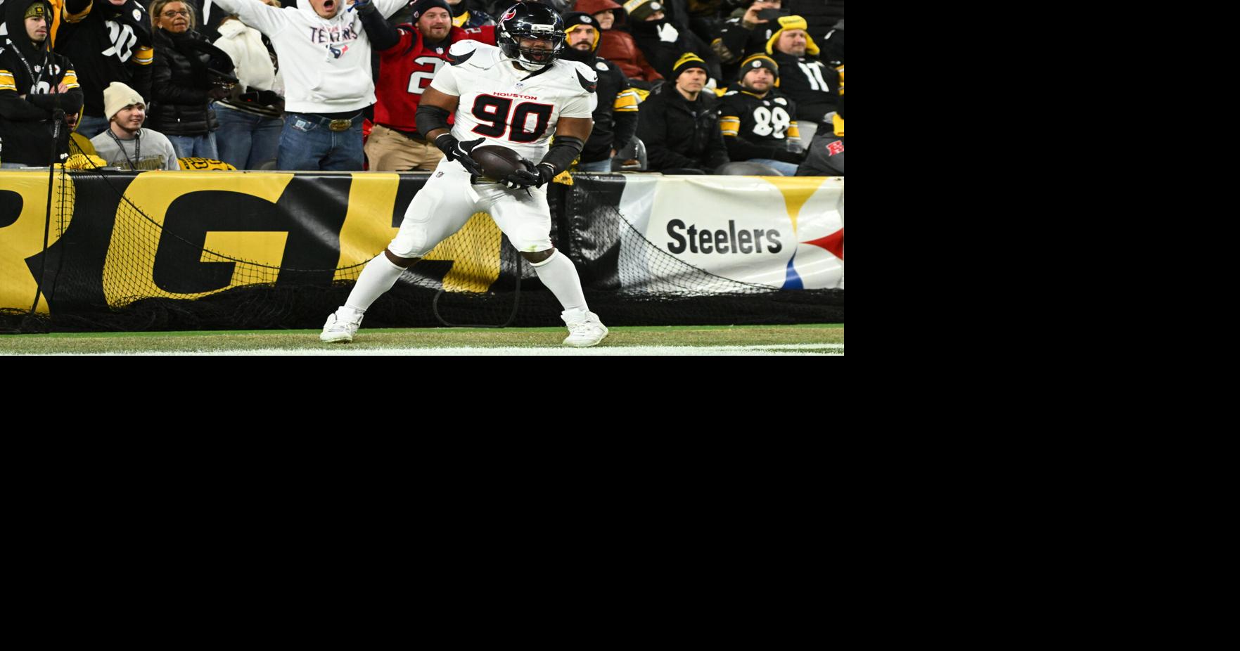 Texans secure first road playoff win with suffocating defensive ...