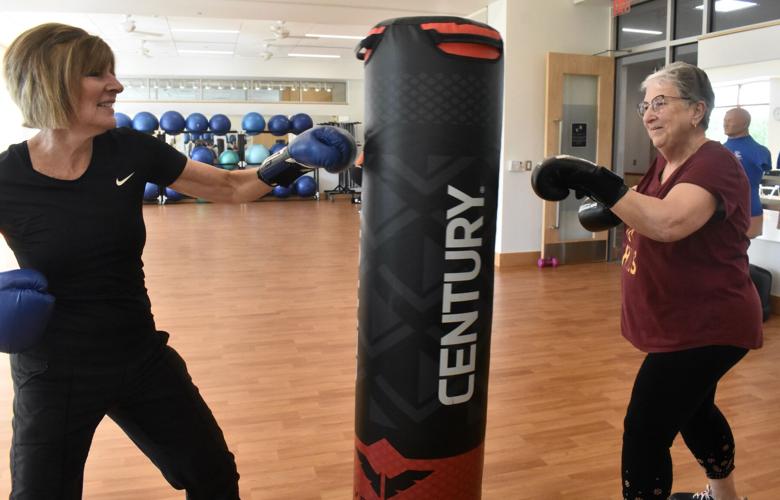 Seniors find boxing program helps with debilitating disease | Local ...