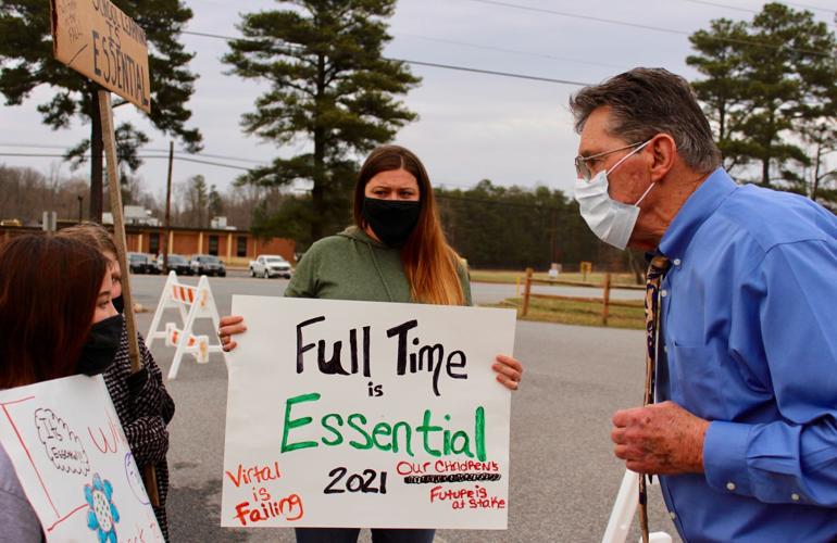 Calvert parents host rally calling for full in-person instruction next ...