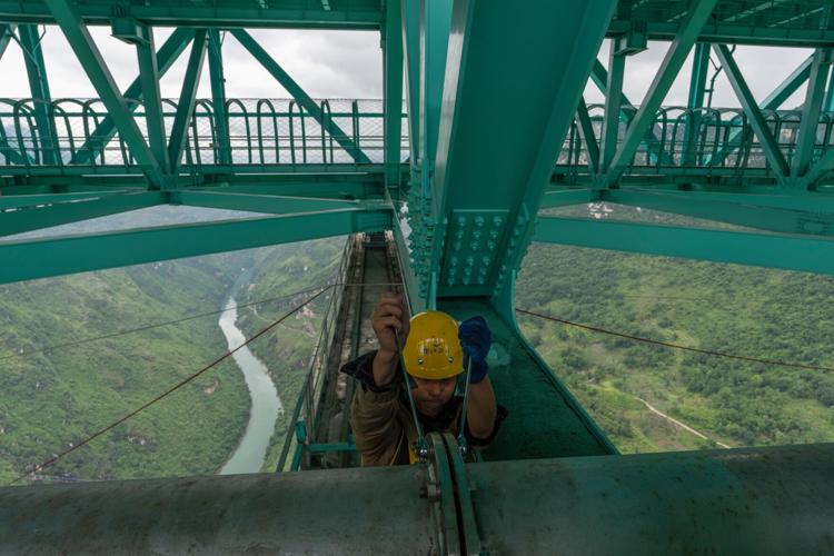 China’s highest bridge brings tourists and internet access to remote ...