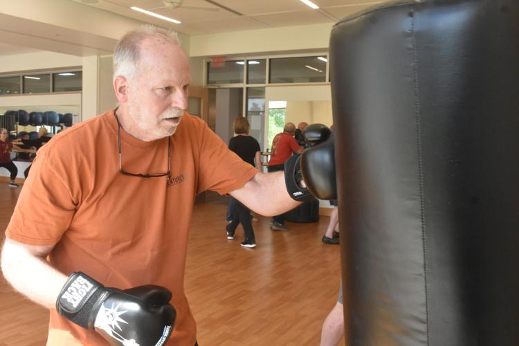 Seniors find boxing program helps with debilitating disease | Local ...