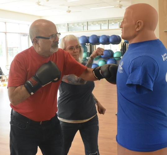 Seniors find boxing program helps with debilitating disease | Local ...