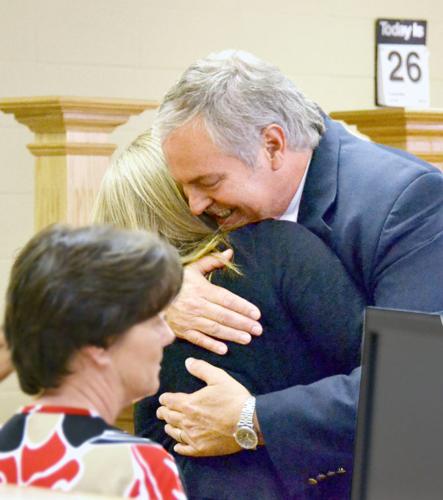Dave Weddle hugs wife.jpg | | somerset-kentucky.com