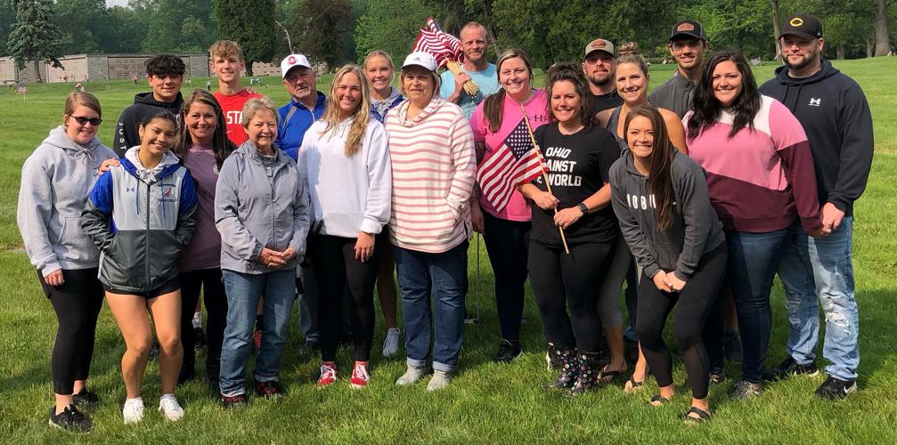 Volunteers ensure flags mark veterans’ graves at Springfield cemetery ...