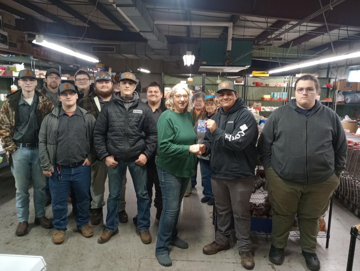 SUN Tech students present donations | Local News | standard-journal.com