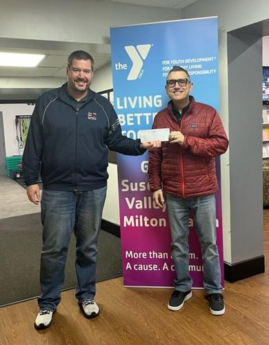 Businesses donate to YMCA | Local News | standard-journal.com