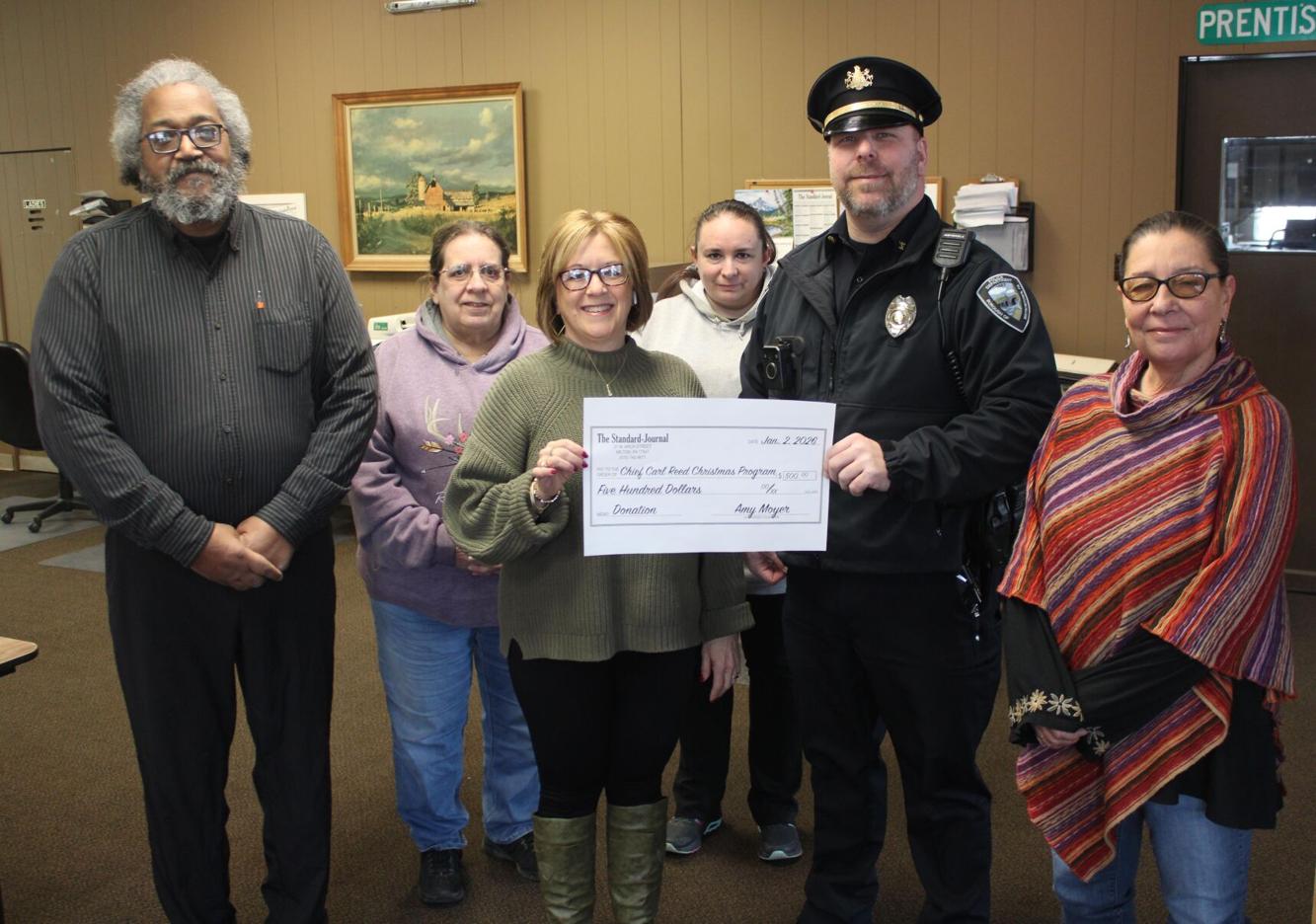 Calendar production boosts police community Christmas fund | Local News ...