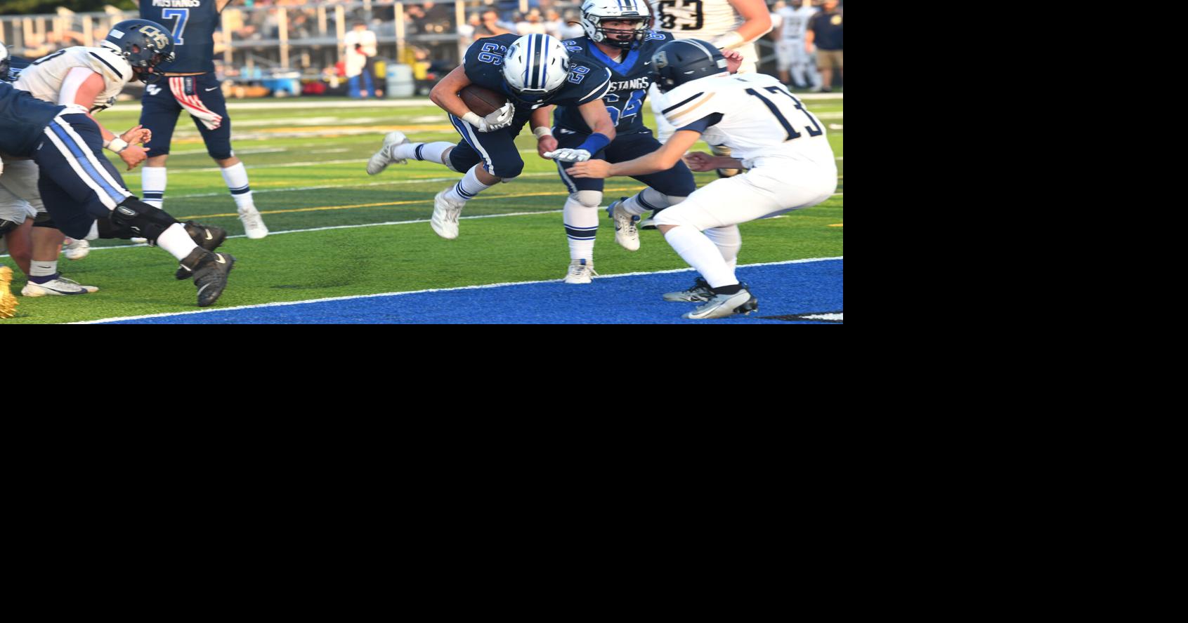 Spartans rally to defeat Mustangs in first game at Reel Stadium ...