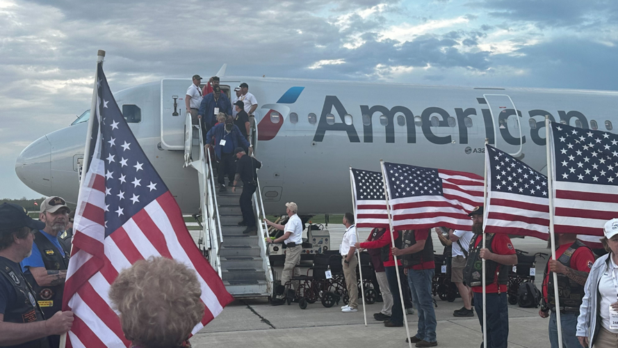 Over 80 veterans receive warm welcome home after Honor Flight to ...