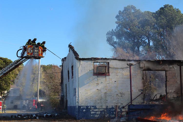 Southern States building taken down in controlled burn | Local ...