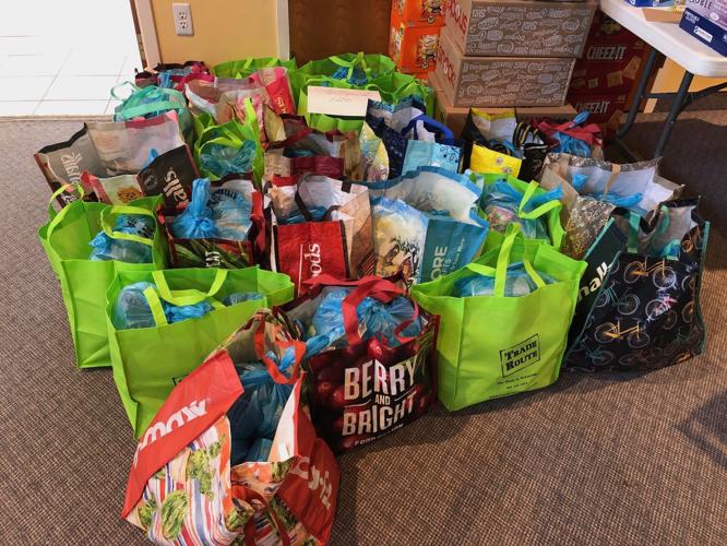 Volunteers round up thousands of lunches for at-risk students | Life ...