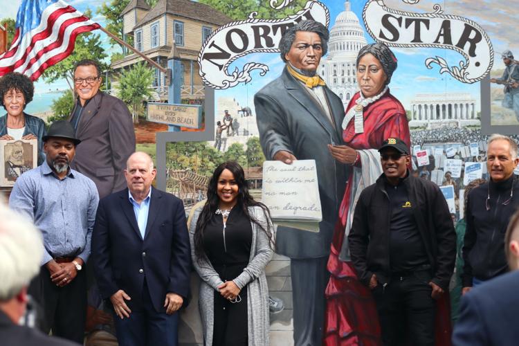 Artist shows Frederick Douglass mural to Gov. Hogan, local officials ...