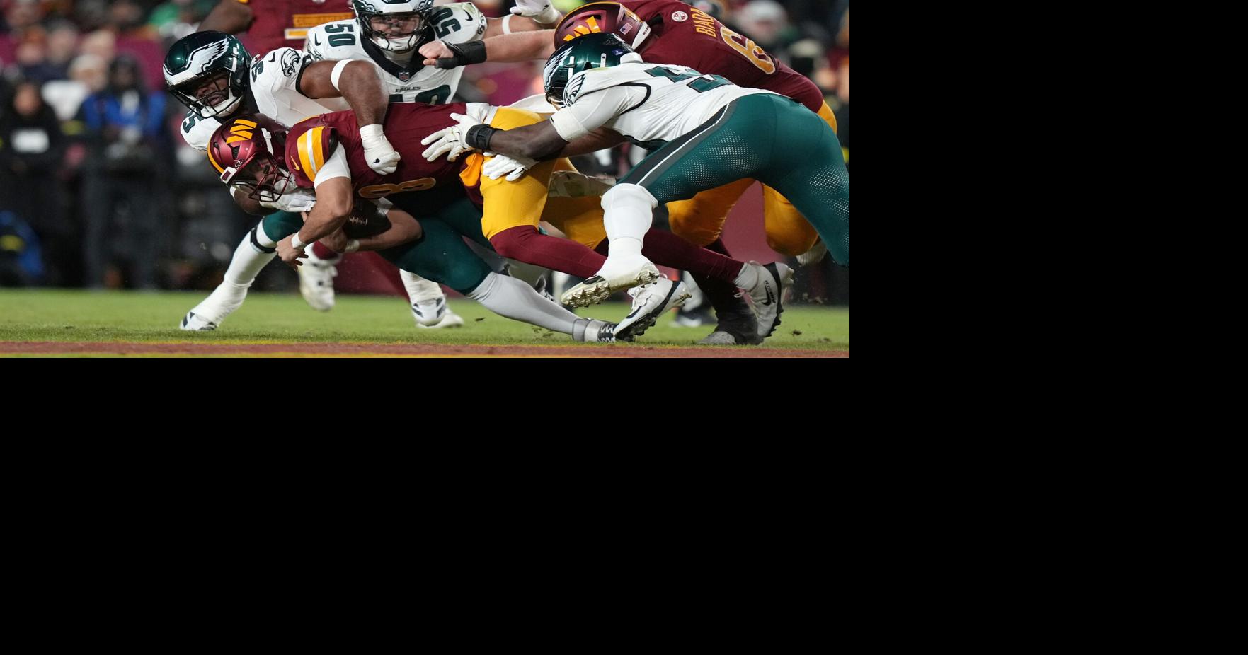 Commanders QB Marcus Mariota leaves game against Eagles with an injured ...