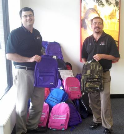 Cellular Connection hosts backpack giveaway | Business | stardem.com