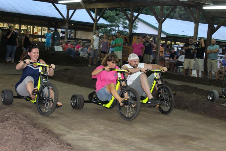 Adults race tricycles at Queen Anne's County Fair | Local | stardem.com