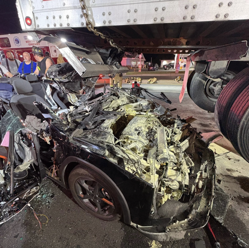 Car gets trapped under tractor-trailer in Cambridge, injures one ...