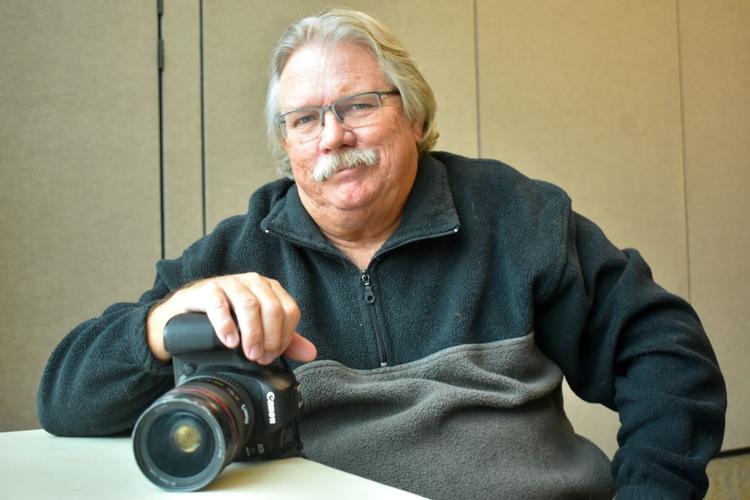 Saunders, former newspaper photo editor, to exhibit work at library ...