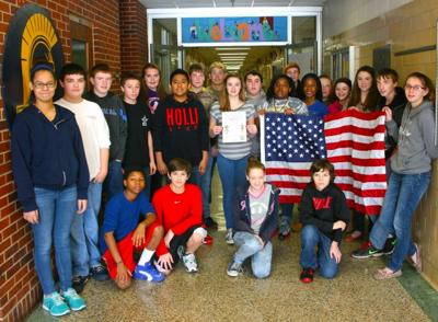 Middle school students get flag from troops | Local | stardem.com