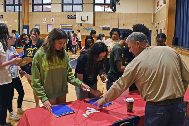 Students learn financial literacy skills playing The Game of Life ...