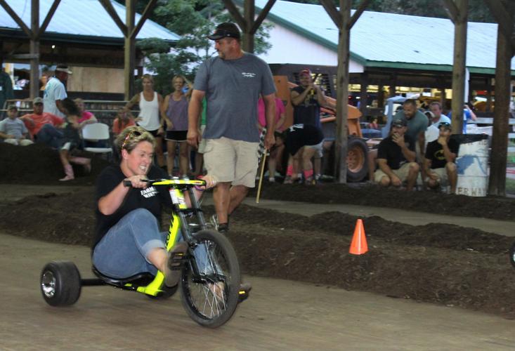 Adults race tricycles at Queen Anne's County Fair | Local | stardem.com