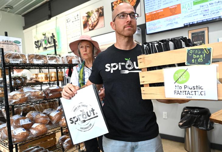 Business owners weigh in on proposal to remove bag fee | Local ...