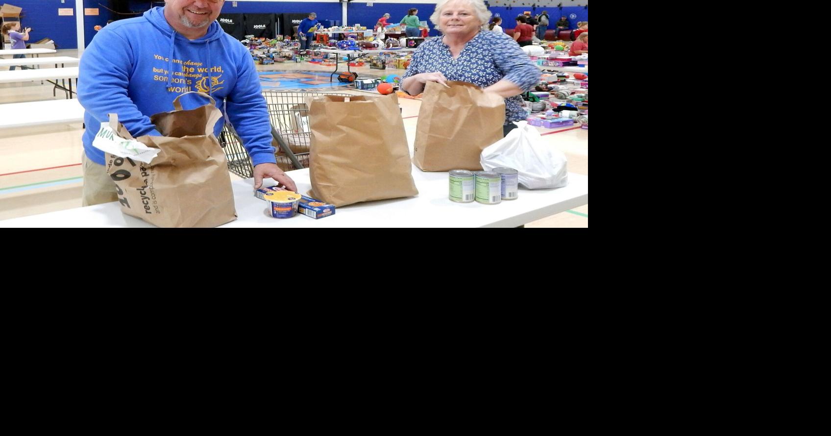 A community project, Christmas Baskets for the Needy brings volunteers ...