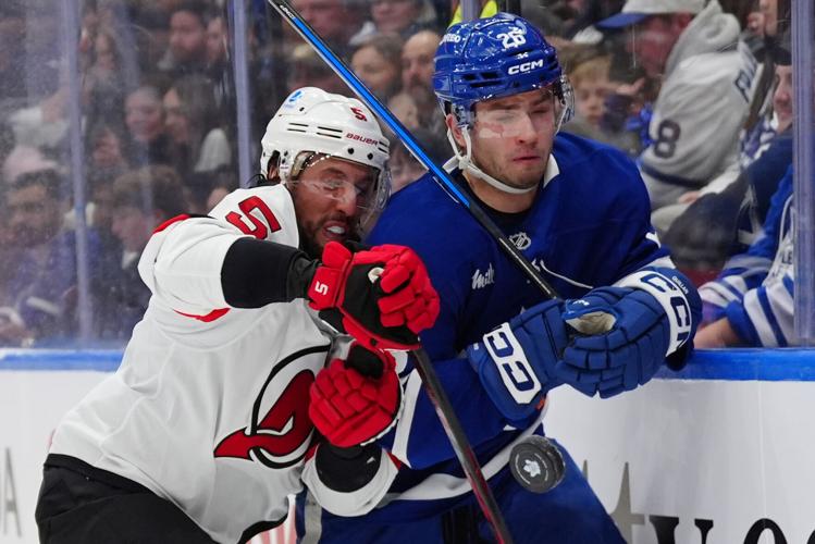 Woll earns 1st shutout of the season as Maple Leafs send Devils to ...